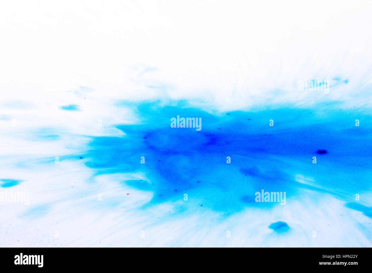 Colorful paint drop splashing on black a background Stock Photo - Alamy