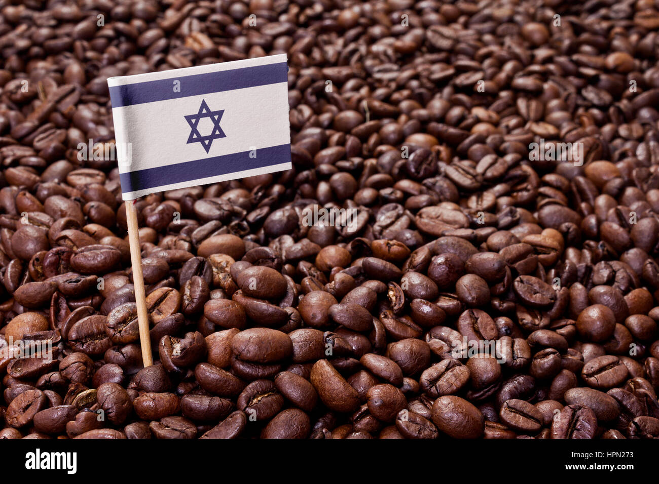 Flag of Israel sticking in roasted coffee beans.(series Stock Photo - Alamy