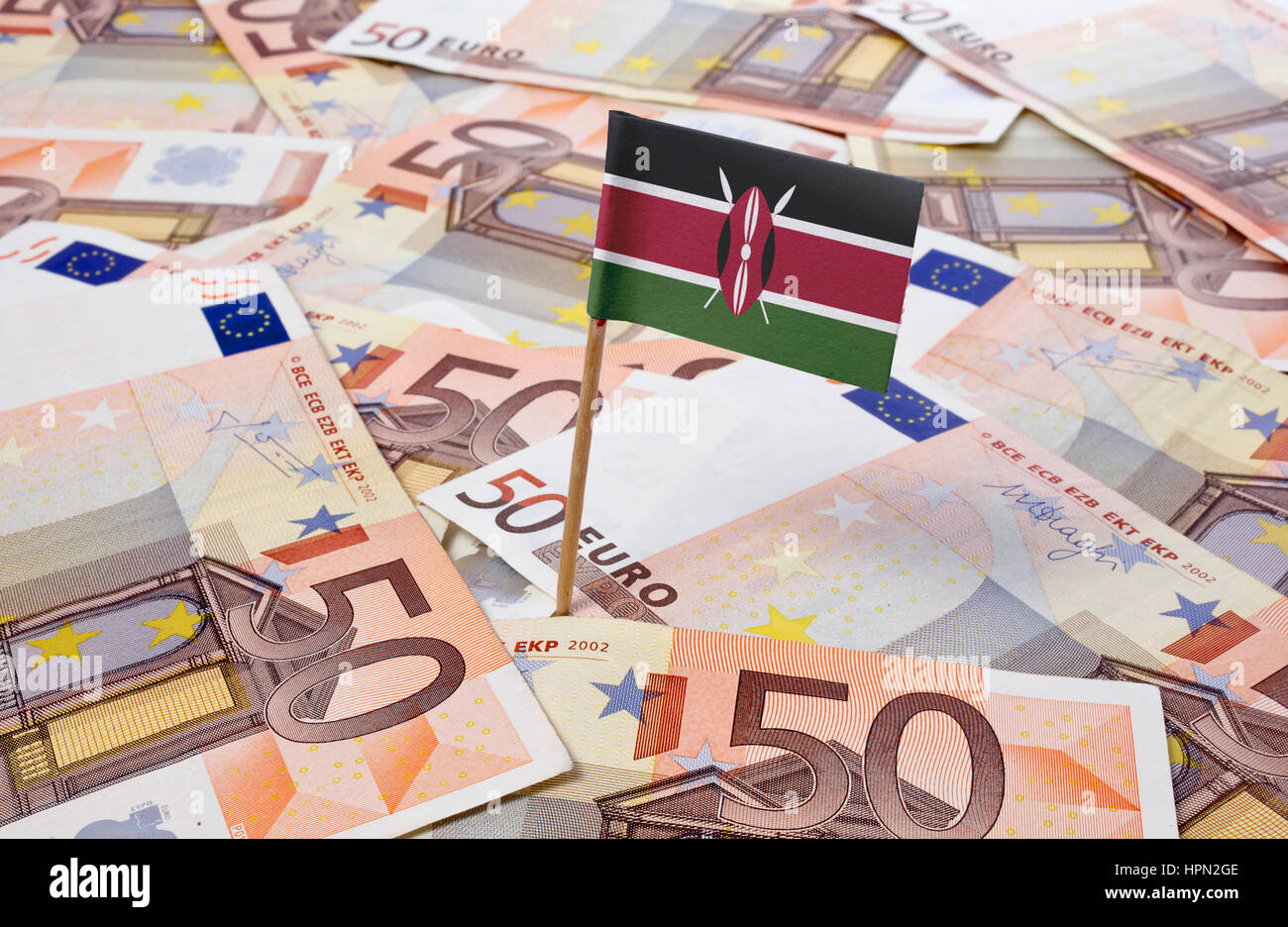 Flag of Kenya sticking in european banknotes.(series Stock Photo - Alamy
