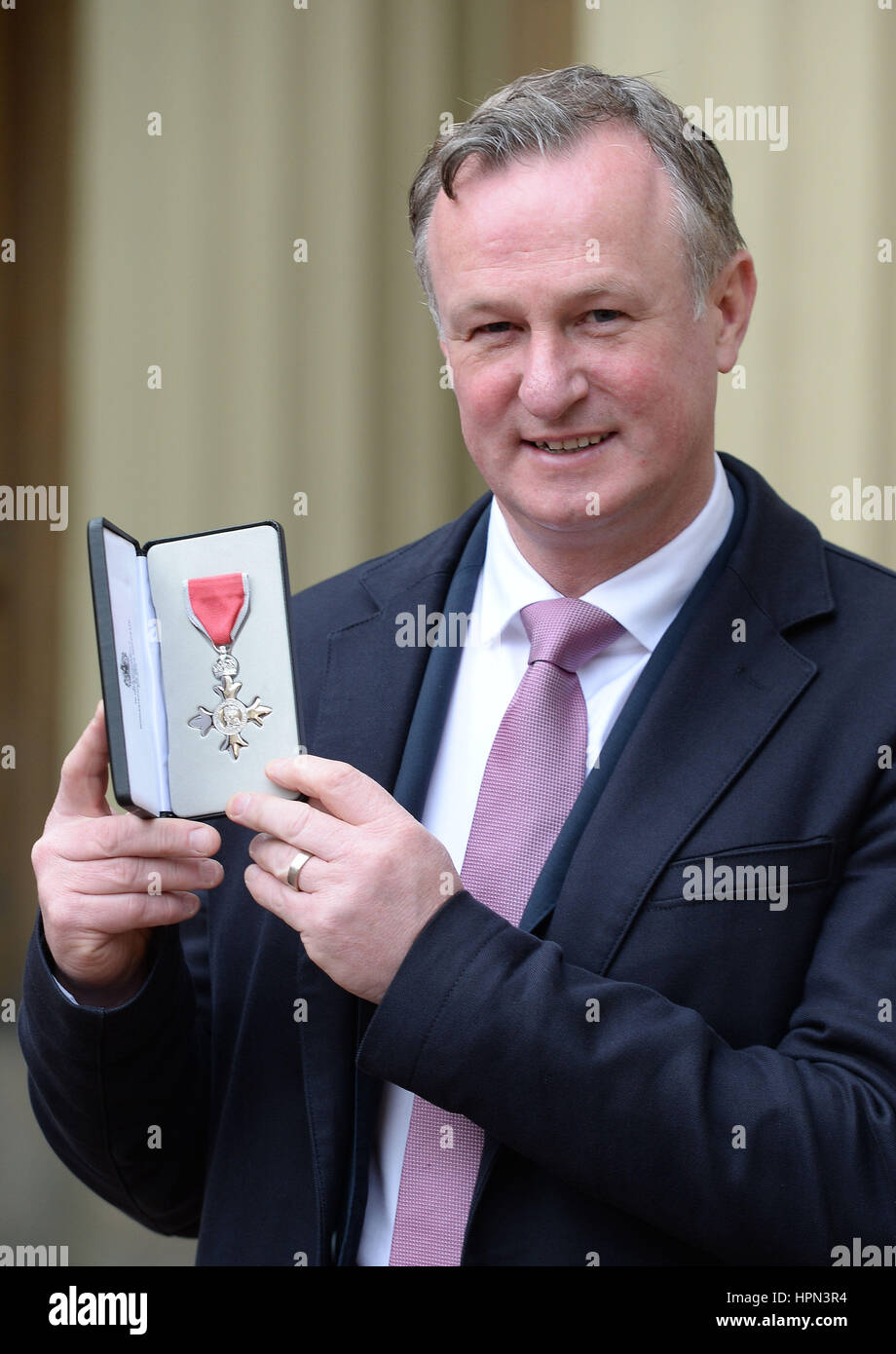 Member order british empire mbe medal during hi-res stock photography ...