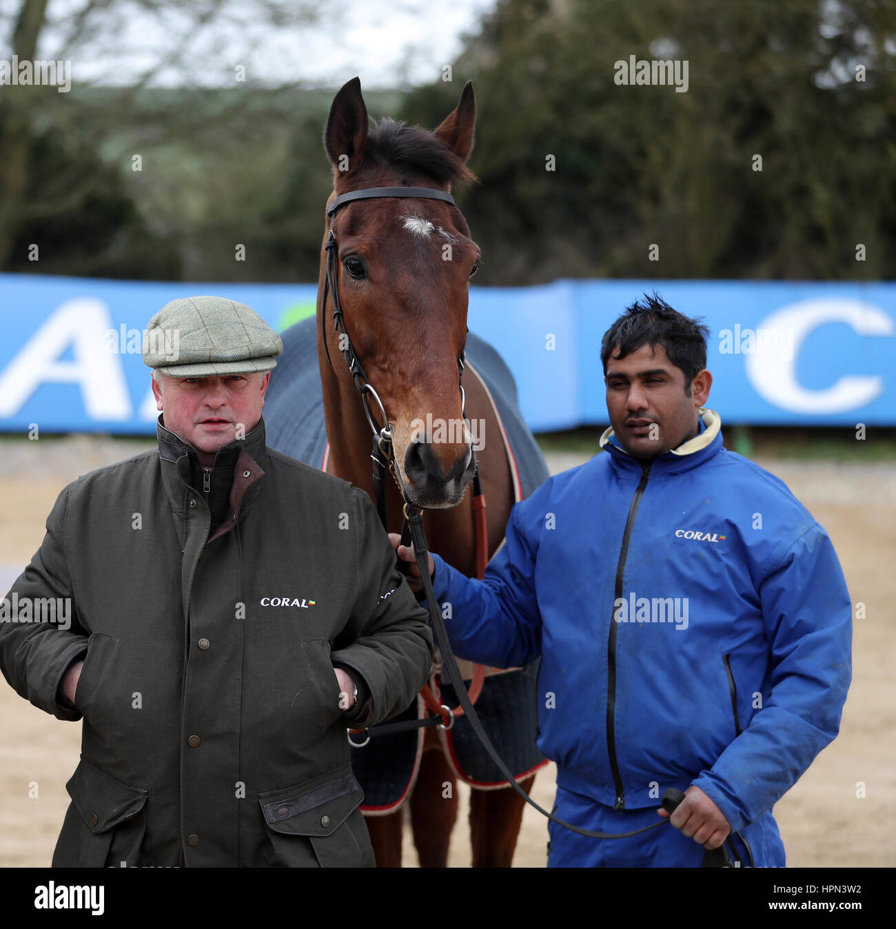 Trainer Colin Tizzard (left) with Cue Card and his handler during a ...