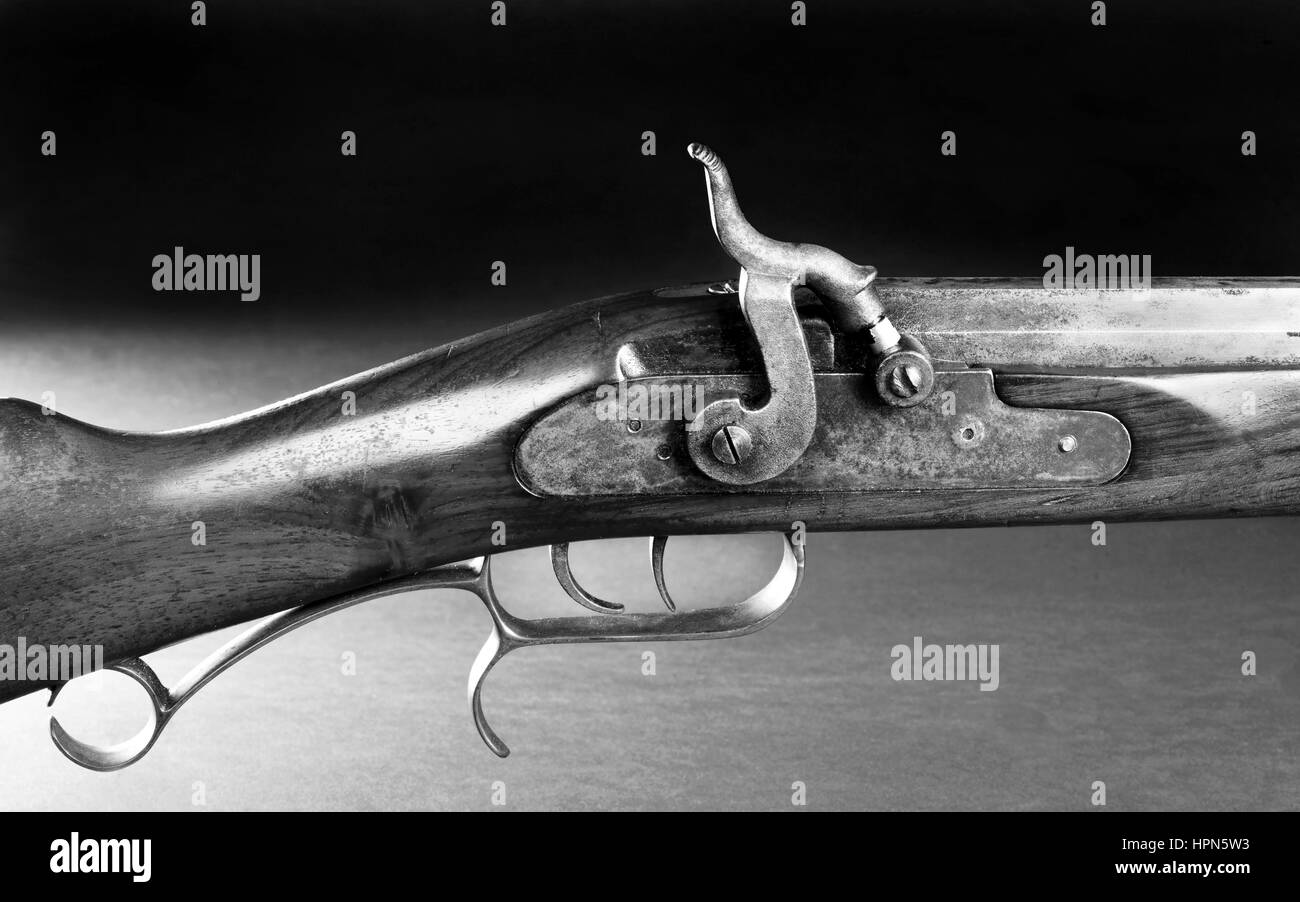 Old black powder cap and ball double trigger rifle in black and white ...