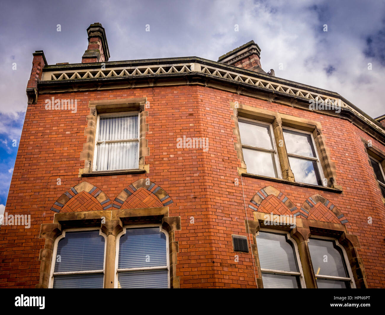 Ornate brickwork detail above window of building, Thirsk, North ...