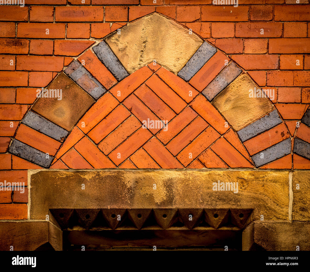 Ornate brickwork detail above window of building, Thirsk, North ...