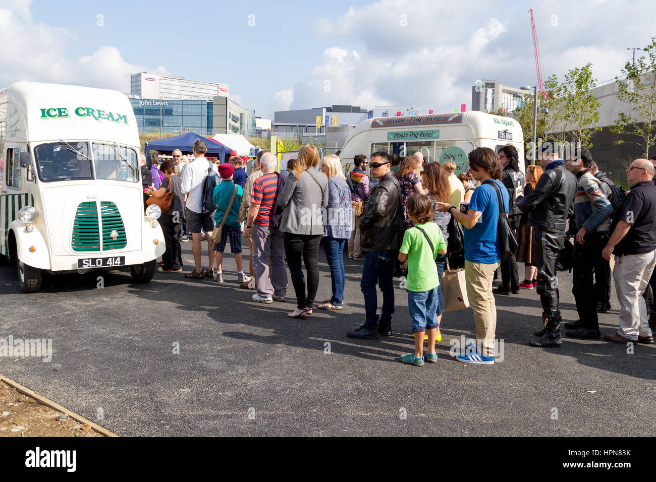 Classic ice cream van, queues of people waiting for ice cream, london ...