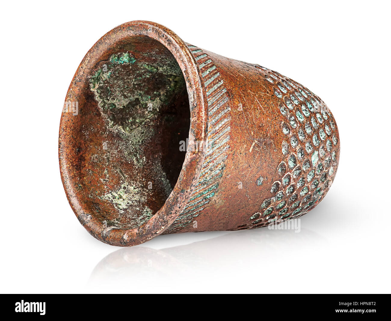 Old antique copper thimble horizontally isolated on white background ...