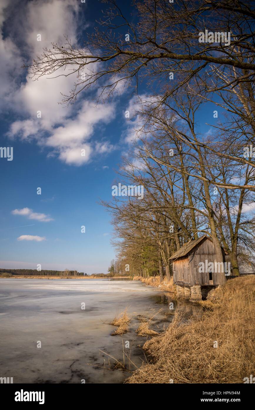 Vertical photo of very early spring natural scene. Landscape with ...