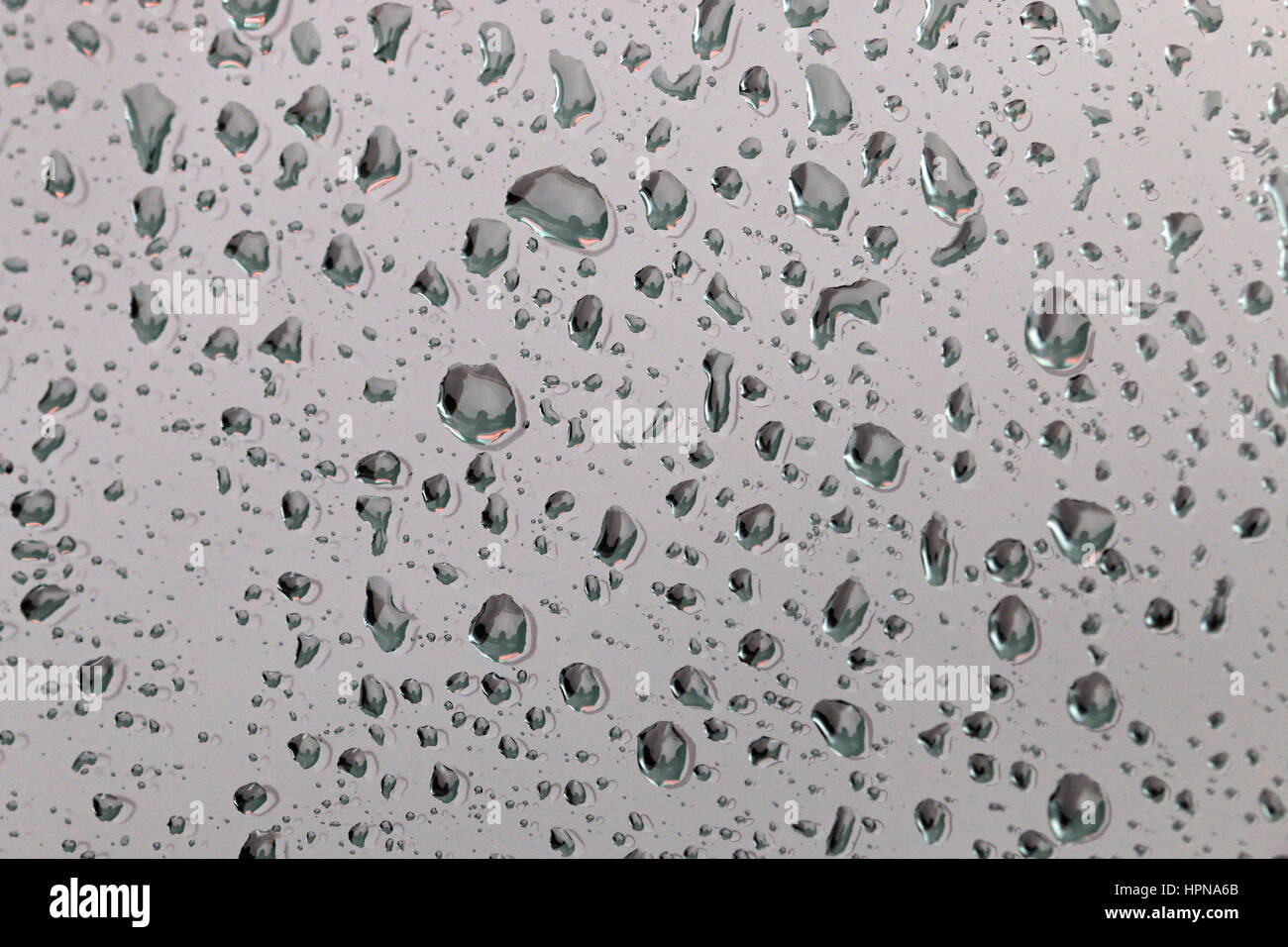 Rain drops on windscreen hi-res stock photography and images - Alamy