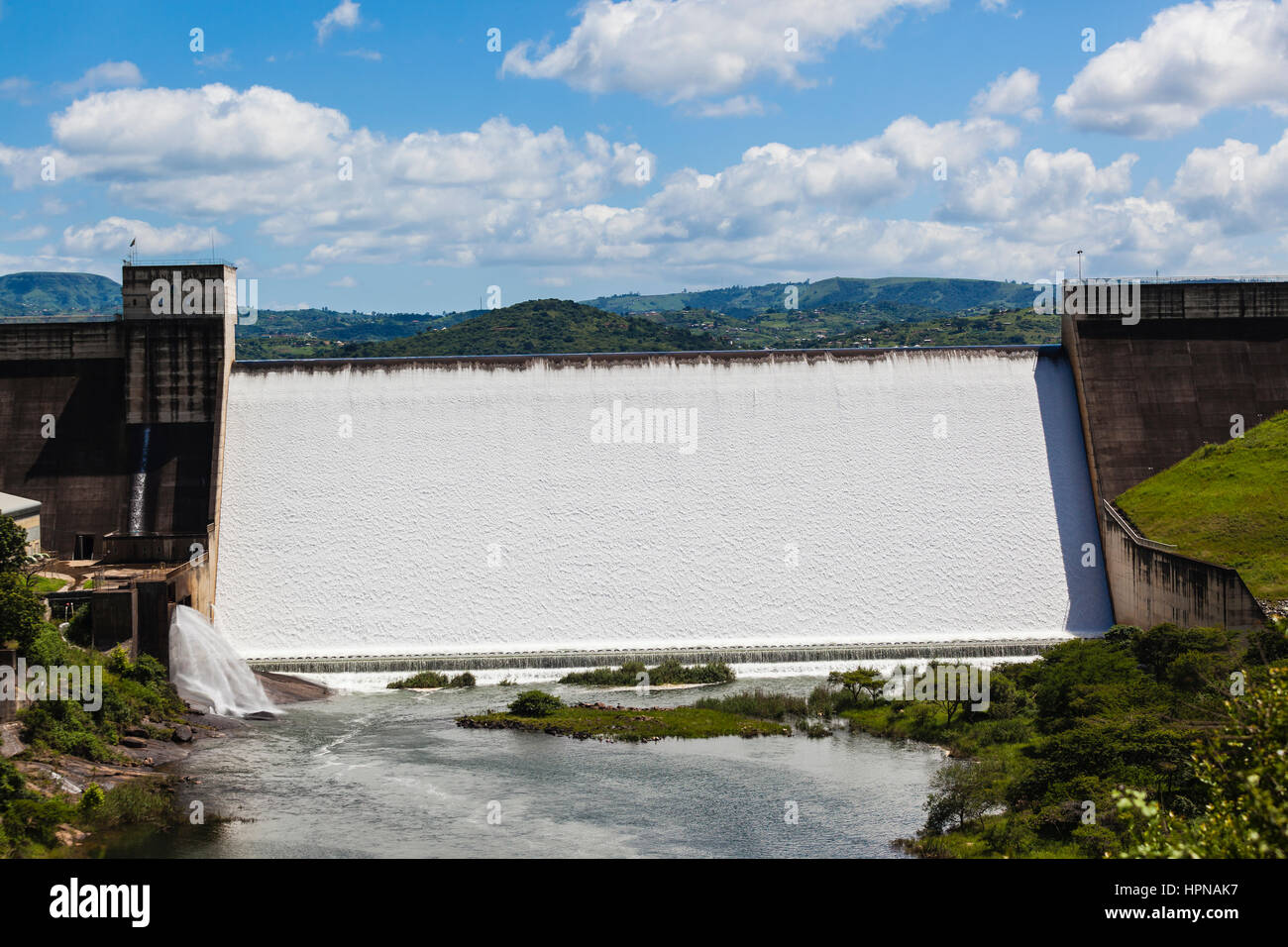 Valley Dam filled to capacity and water flowing over the high wall in ...