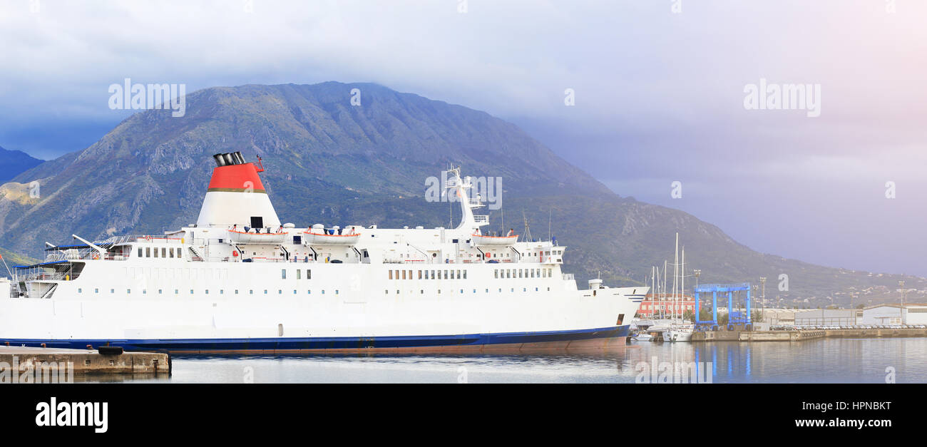 White big cruise shipe docked in port Stock Photo - Alamy