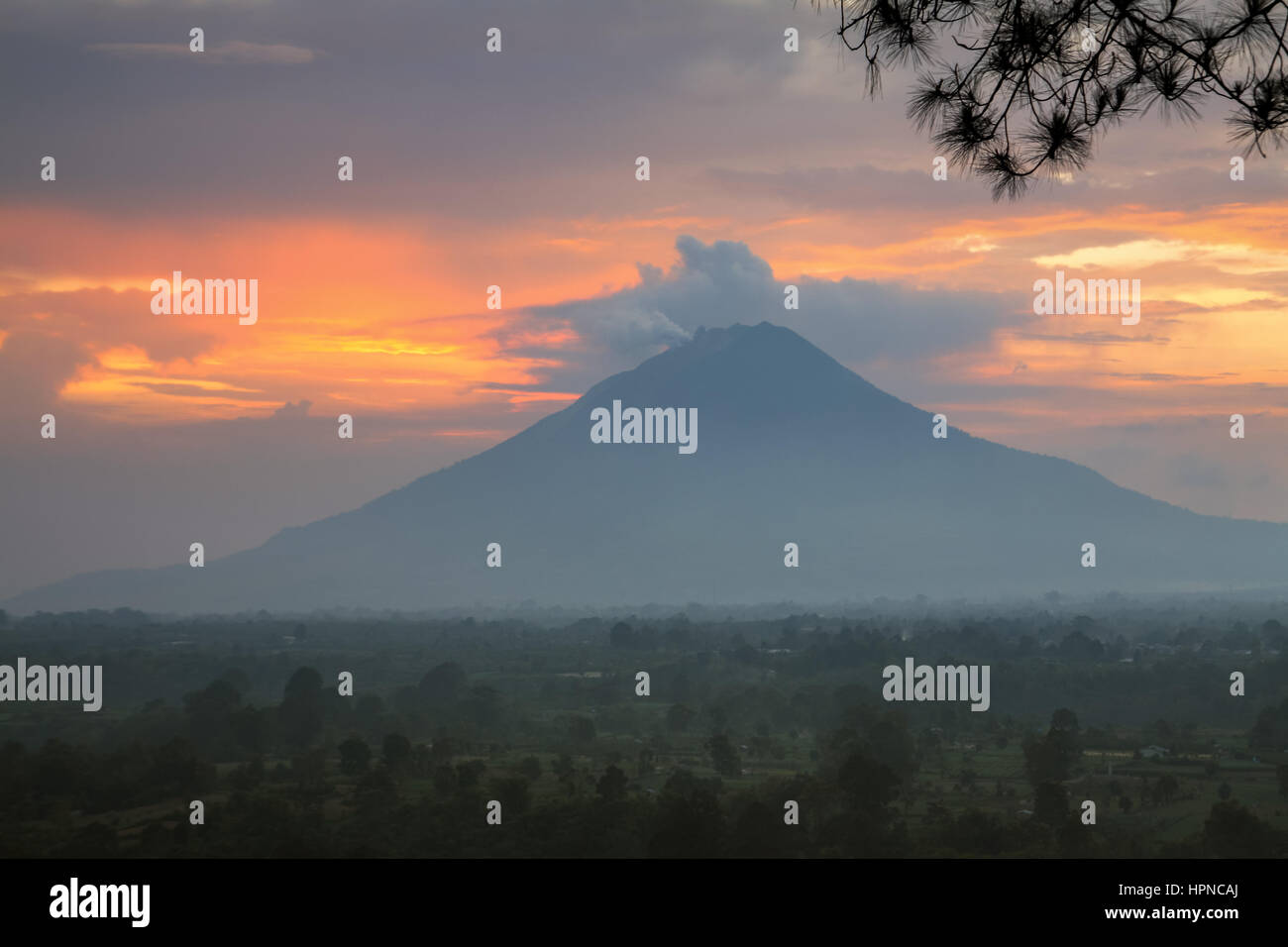 Colourful Sunset mountain Mount Sinabung in the Karo Highlands of North ...