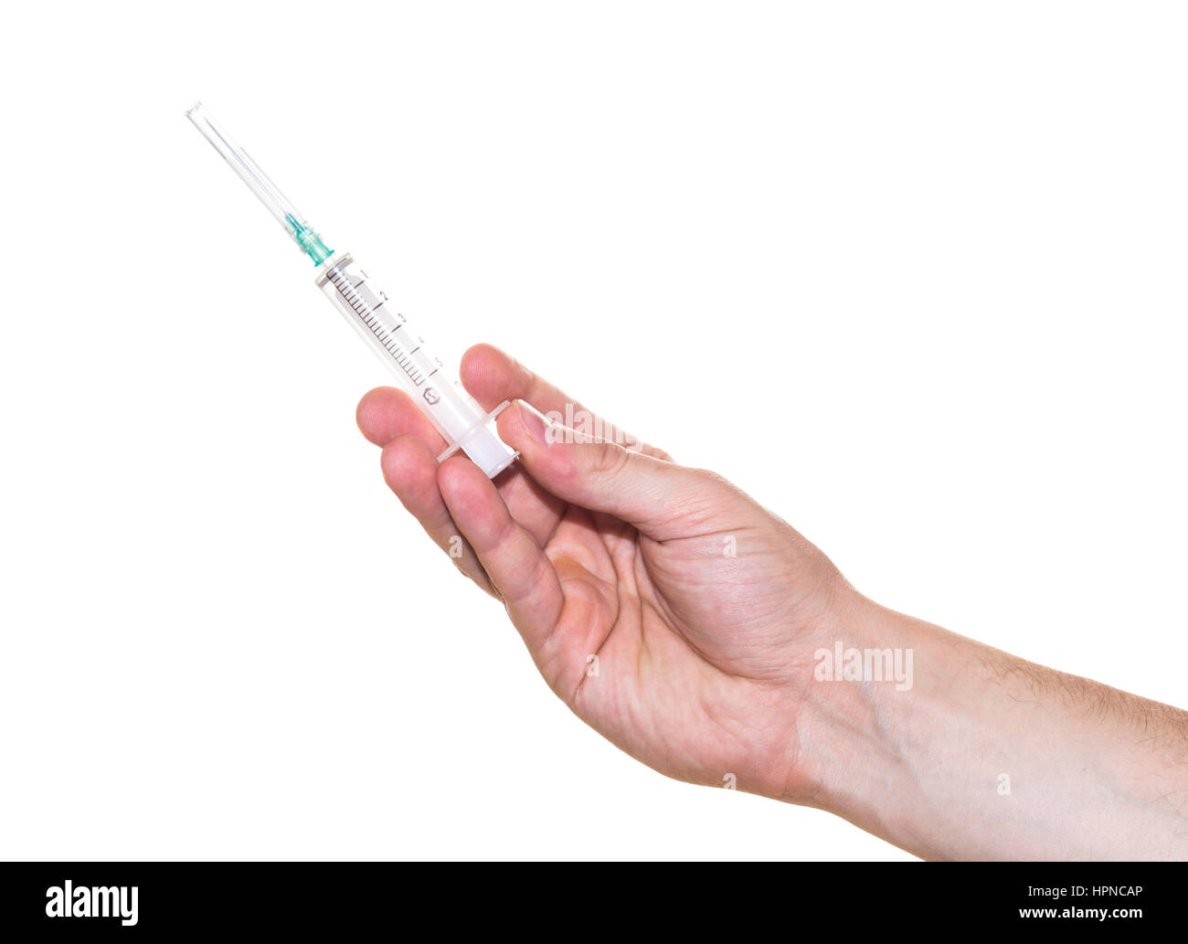 Hand holding syringe with needle on white background Stock Photo - Alamy