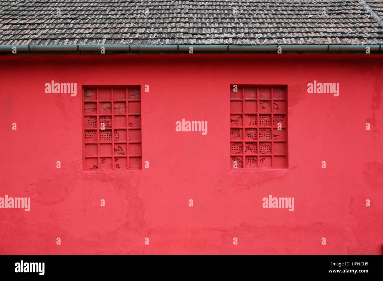 red house red wall red windows Stock Photo - Alamy