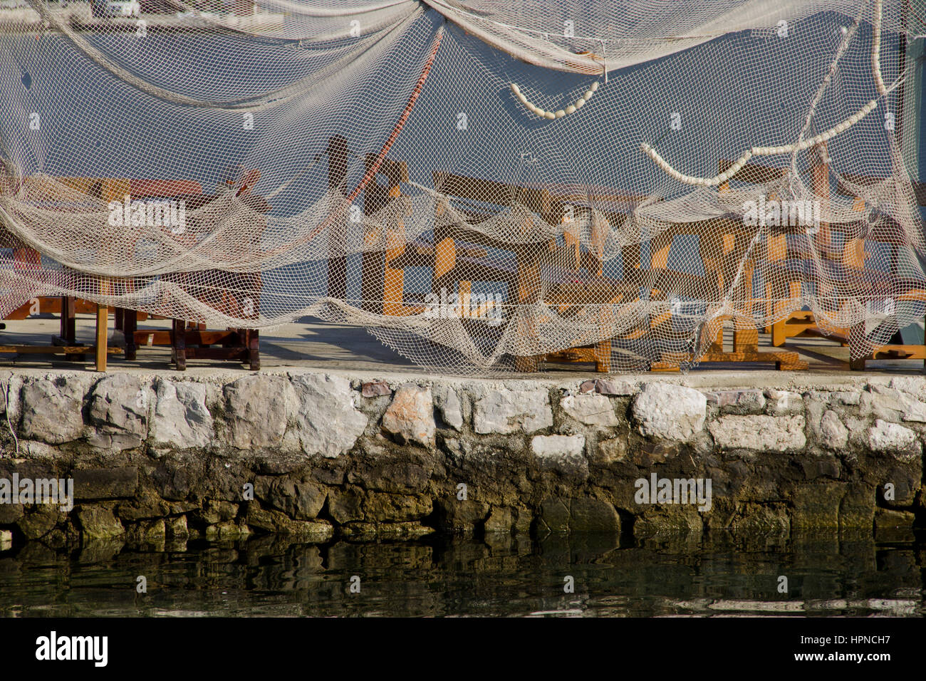 restaurant terrace with fishnets Stock Photo - Alamy