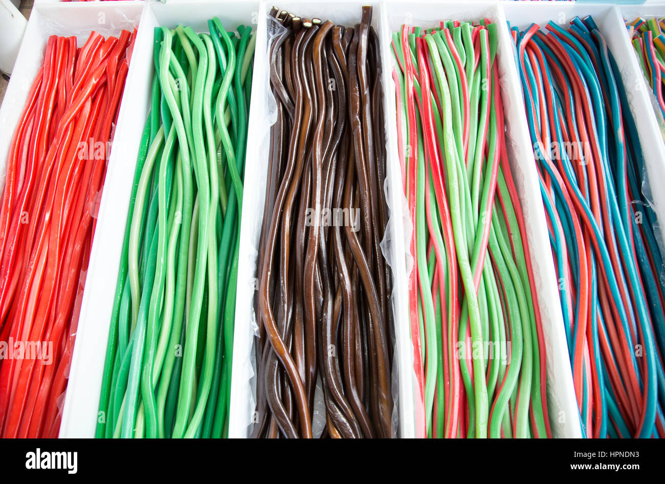 Homemade twisted colorful twisted licorice candies as a background ...