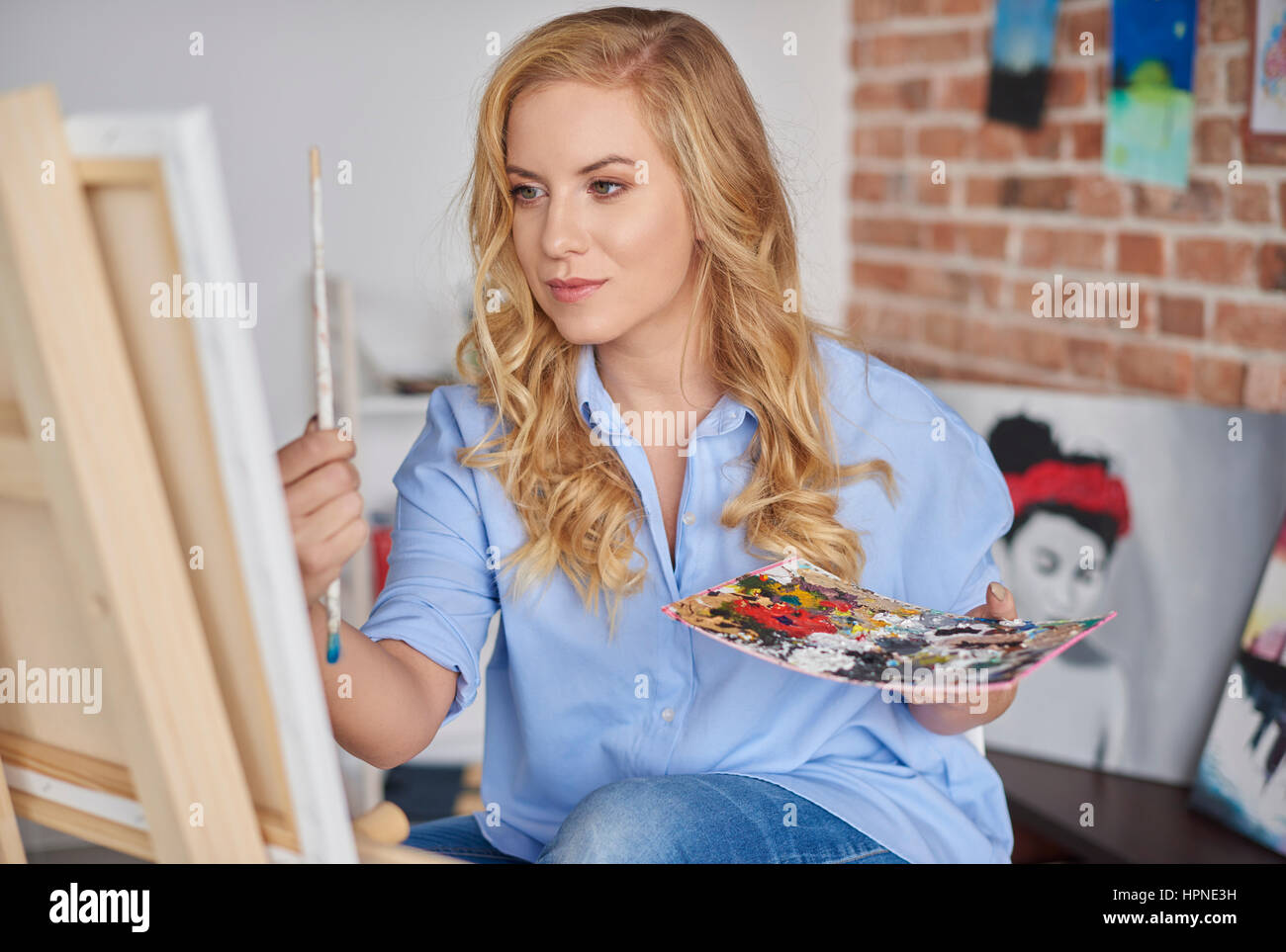 Checking the perspective on the painting Stock Photo - Alamy