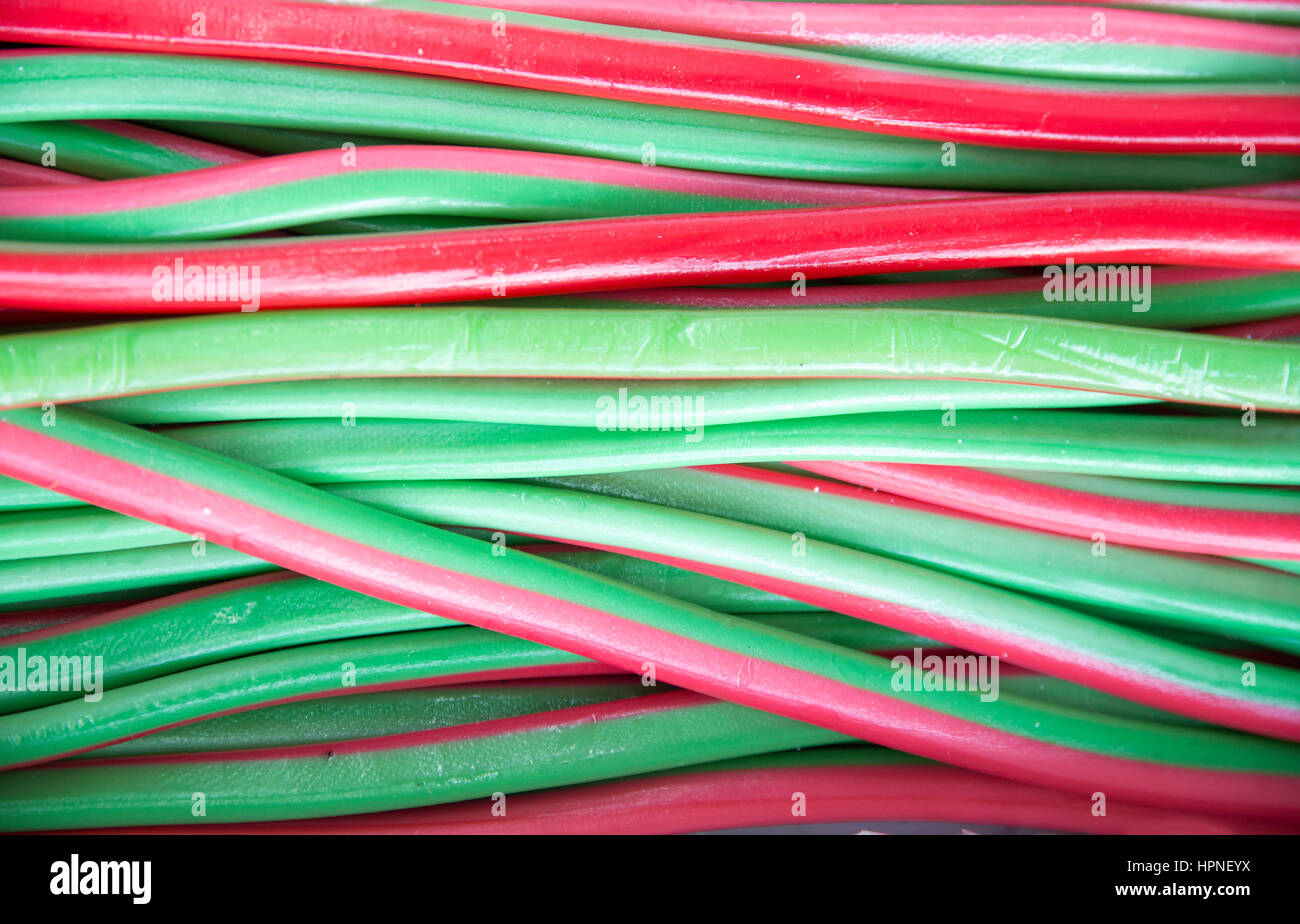Homemade twisted colorful twisted licorice candies as a background ...