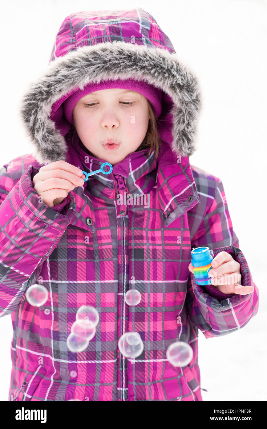 Girl child blowing bubbles hi-res stock photography and images - Alamy