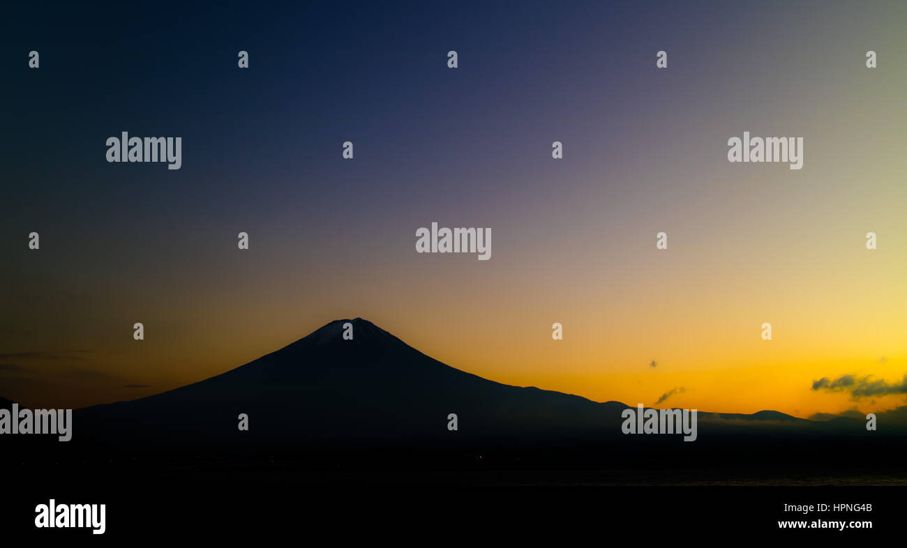 Mt.Fuji as the sun goes down, creating a lovely orange in the sky Stock ...