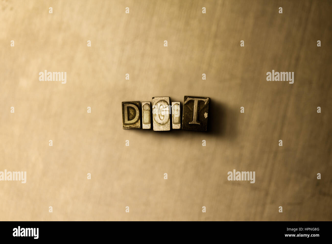 DIGIT - close-up of grungy vintage typeset word on metal backdrop ...