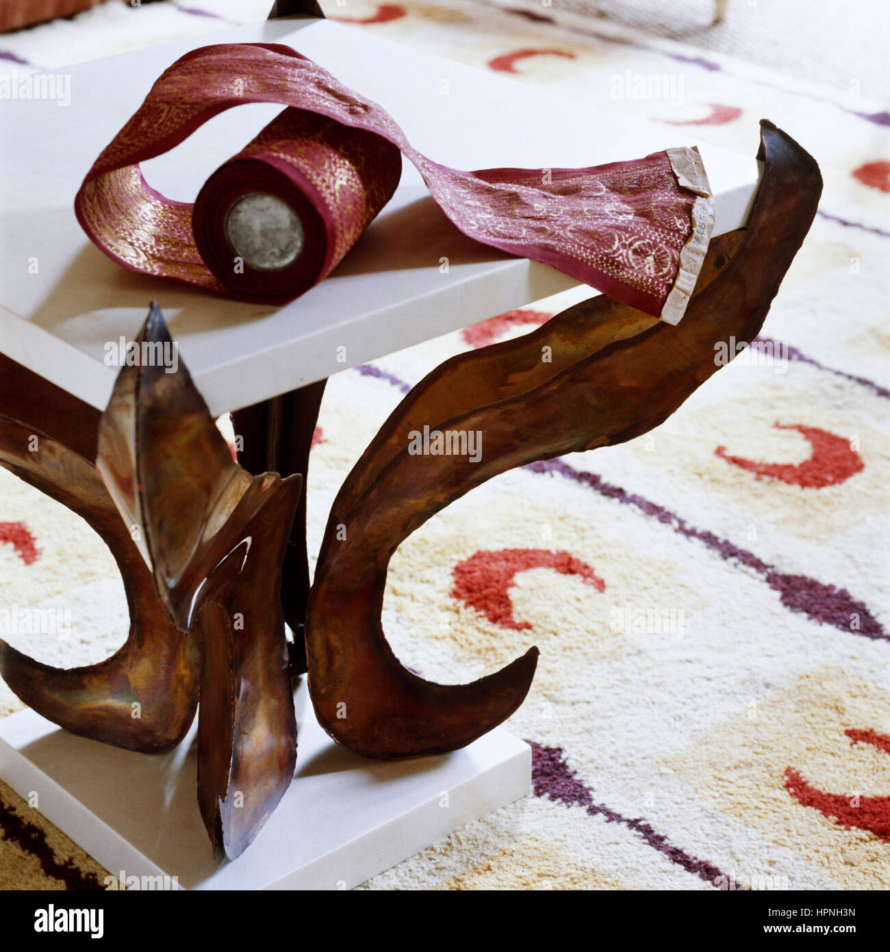 A contemporary coffee table with ribbon Stock Photo - Alamy