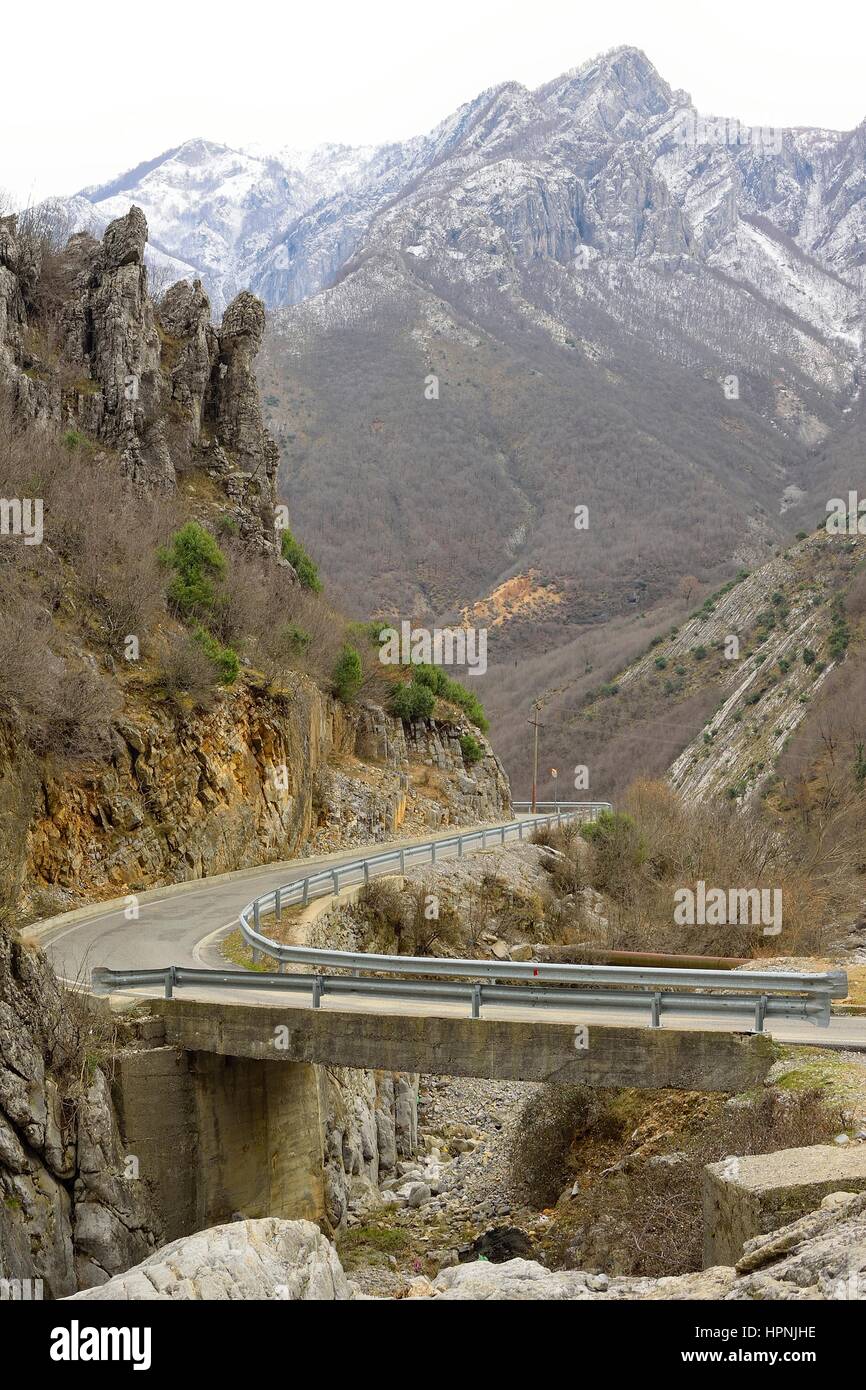 A bridge in the high mountains above a dried river Stock Photo - Alamy