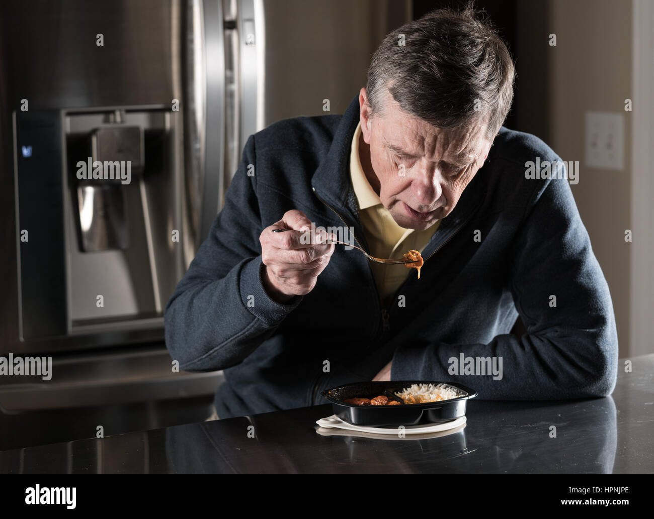 Man eating curry hi-res stock photography and images - Alamy