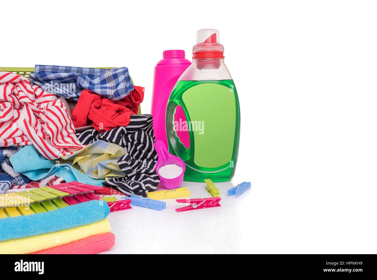 Dirty laundry and washing powder. Preparing the wash cycle Stock Photo ...