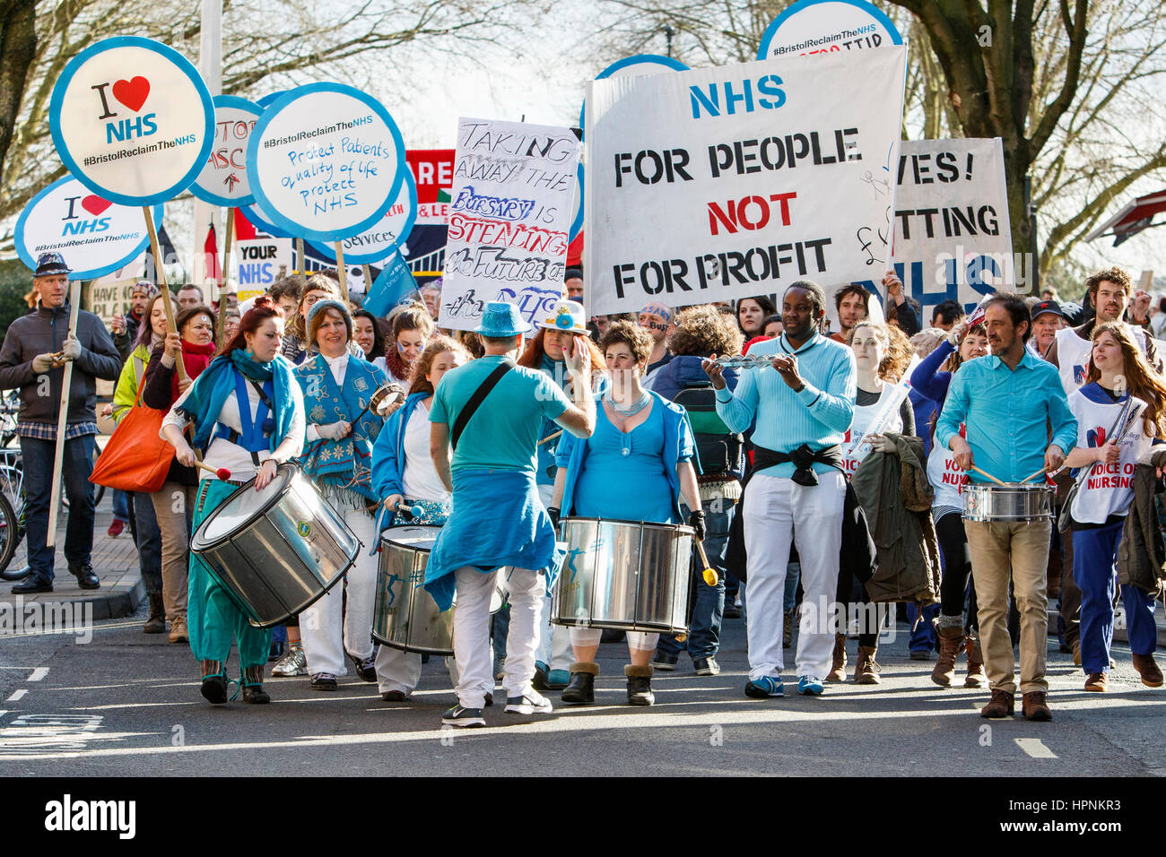 NHS Protesters carrying placards and signs are pictured as they take ...