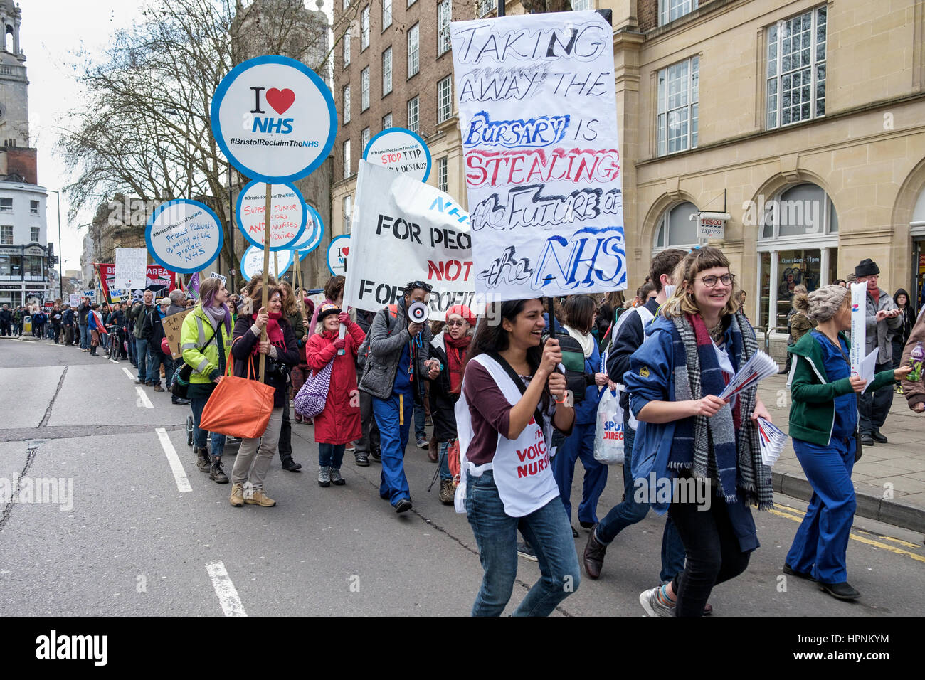 NHS Protesters carrying placards and signs are pictured as they take ...