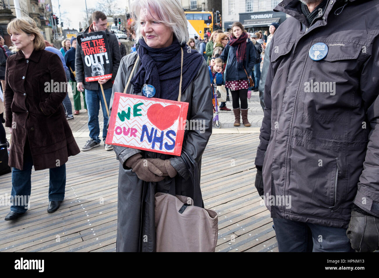 NHS Protesters carrying placards and signs are pictured as they take ...