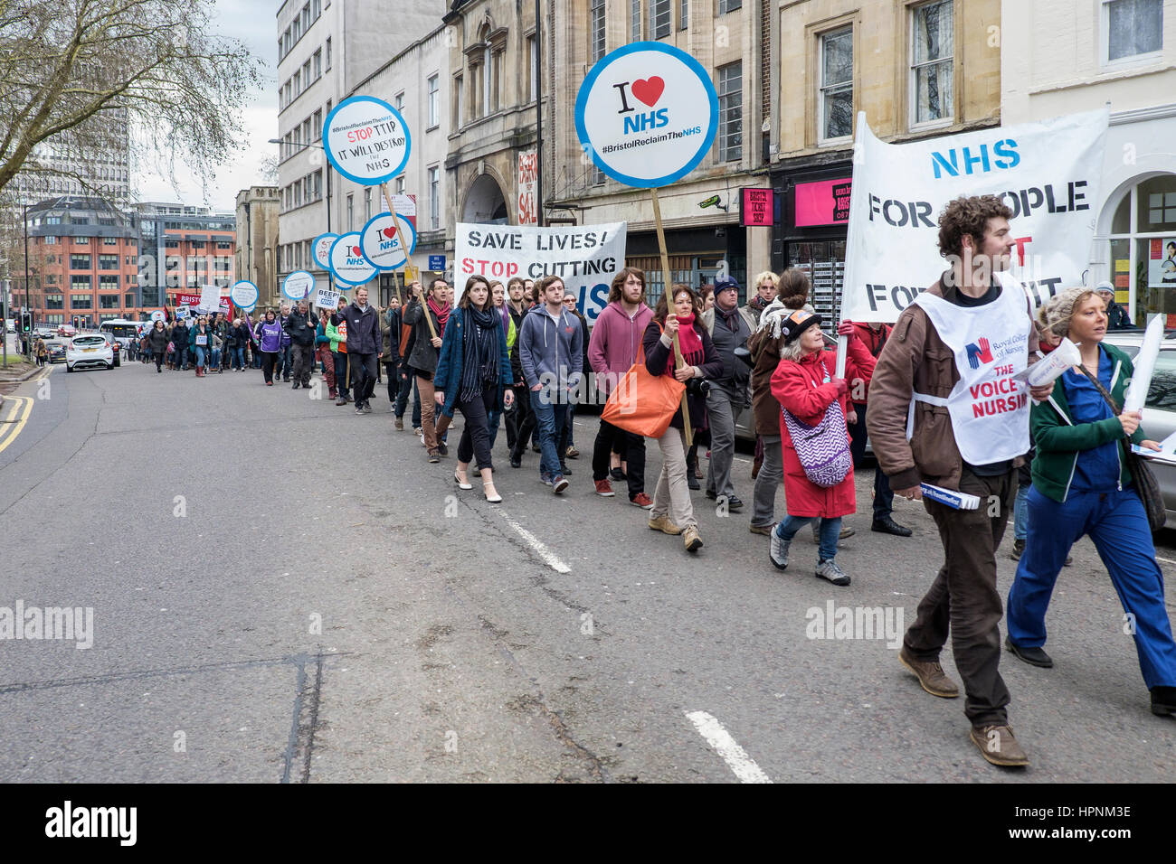 NHS Protesters carrying placards and signs are pictured as they take ...