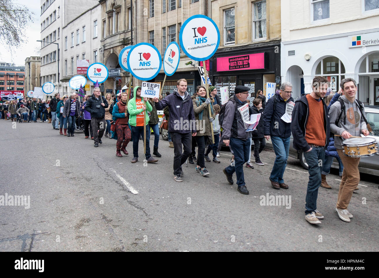 NHS Protesters carrying placards and signs are pictured as they take ...