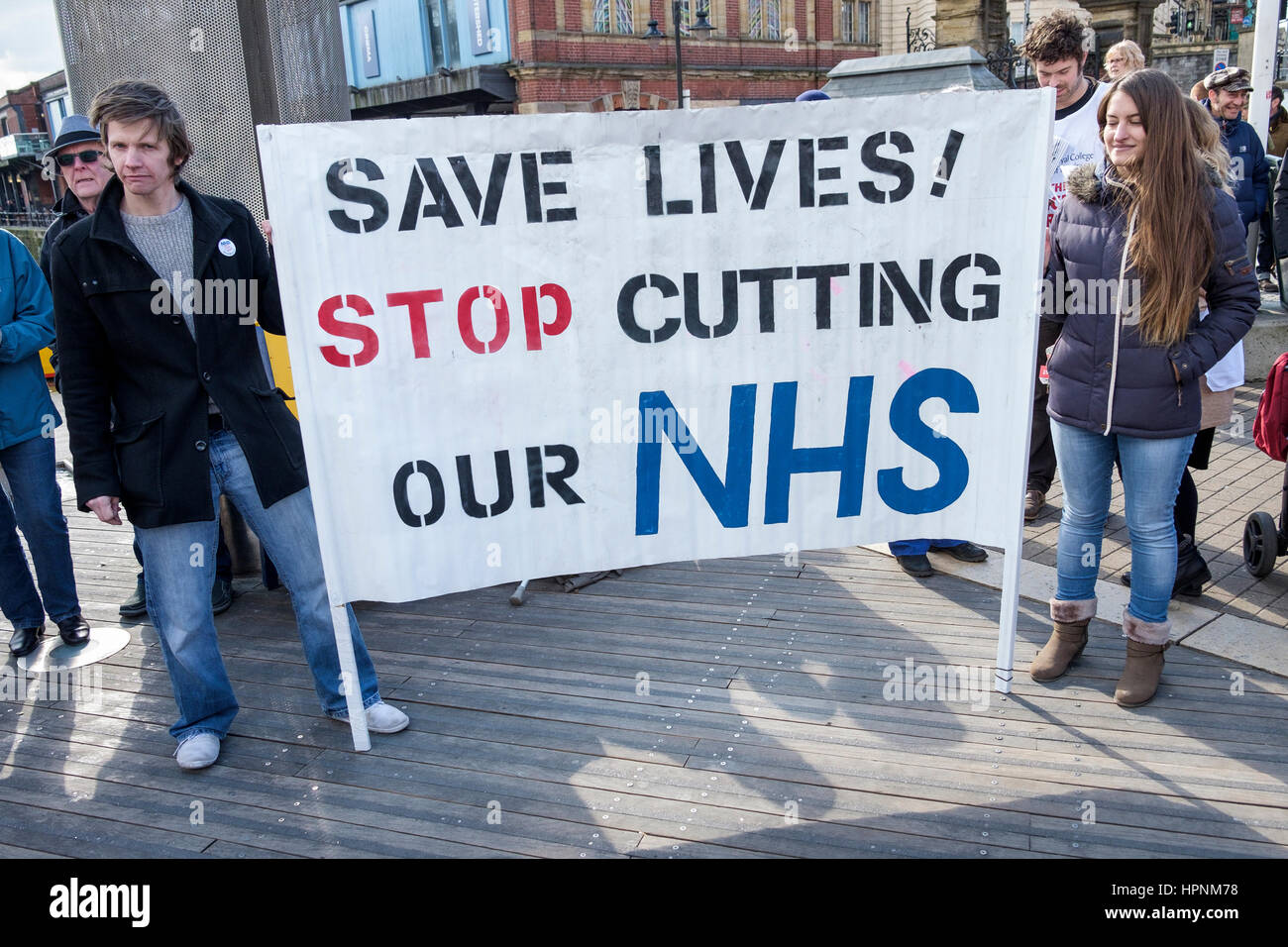 NHS Protesters carrying placards and signs are pictured as they take ...