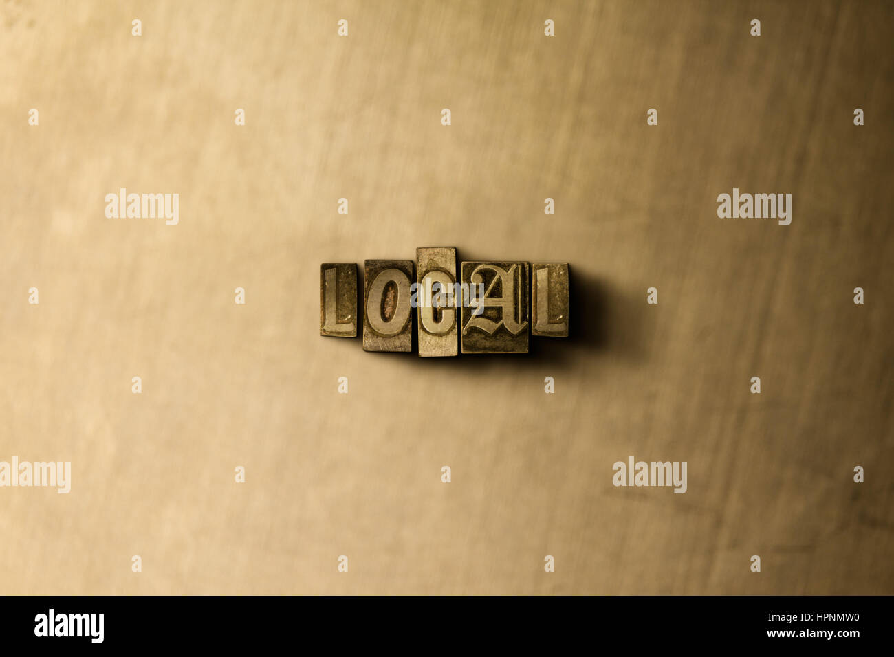 LOCAL - close-up of grungy vintage typeset word on metal backdrop. Royalty free stock ...