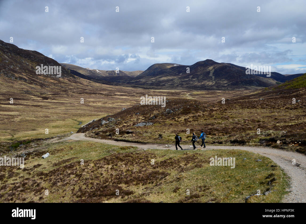 Three Hikers Walking down Remote Strath an Eilich Towards Dalnashallag ...