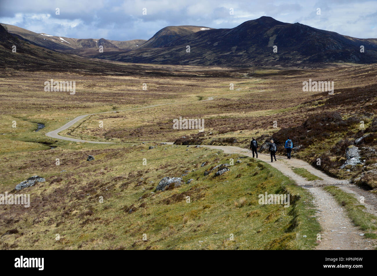 Three Hikers Walking down Remote Strath an Eilich Towards Dalnashallag ...