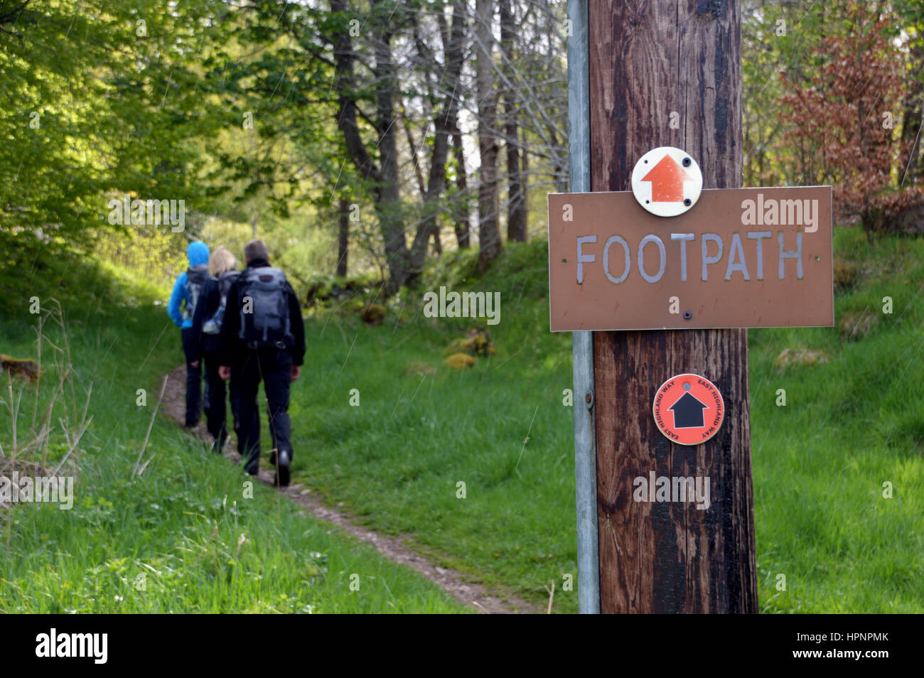 Hiking guide 3 people hi-res stock photography and images - Alamy