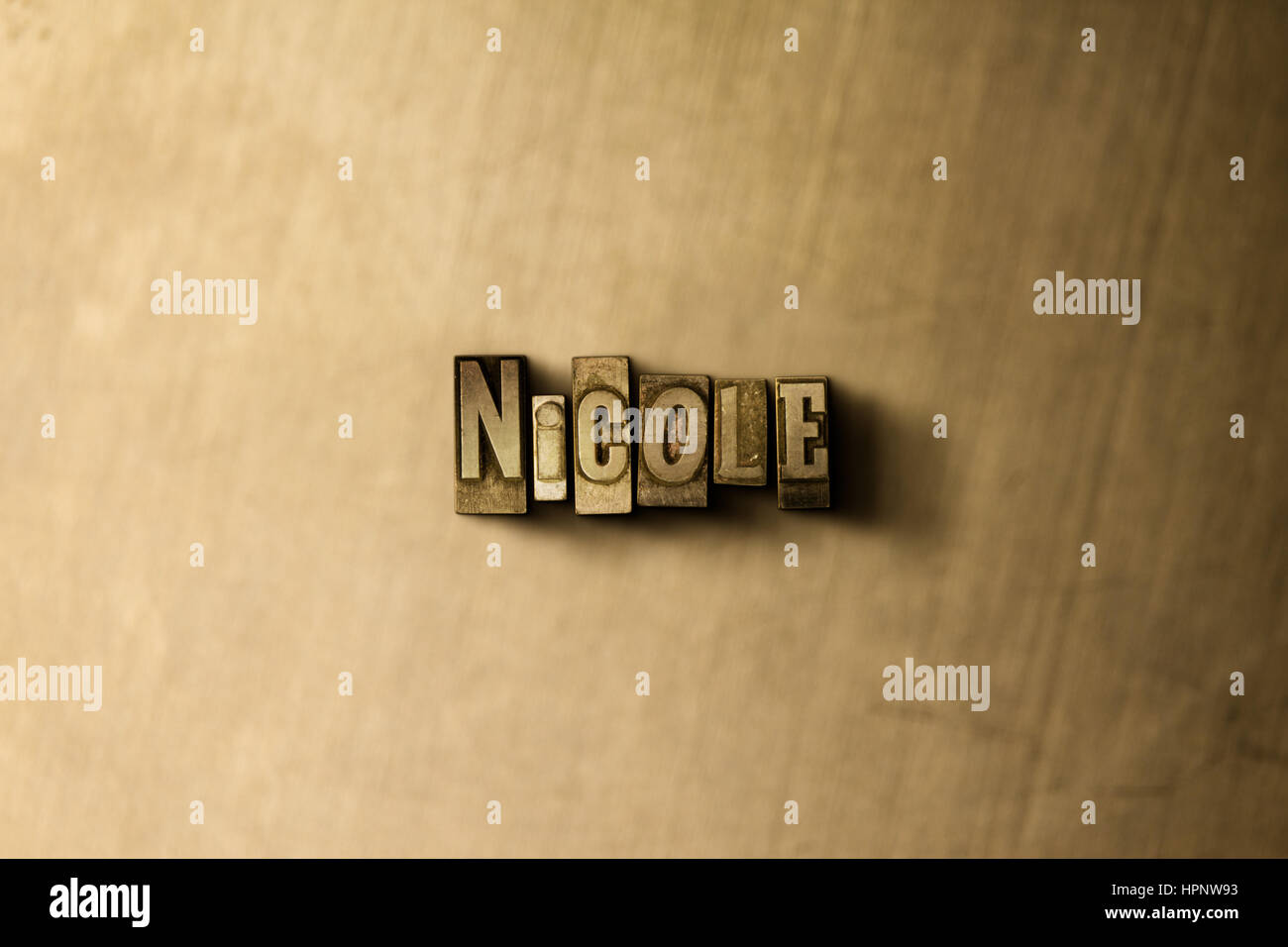 NICOLE - close-up of grungy vintage typeset word on metal backdrop ...