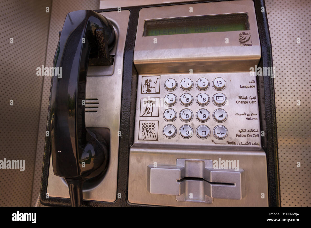 AL AIN, UNITED ARAB EMIRATES - Public telephone keypad and hand set ...