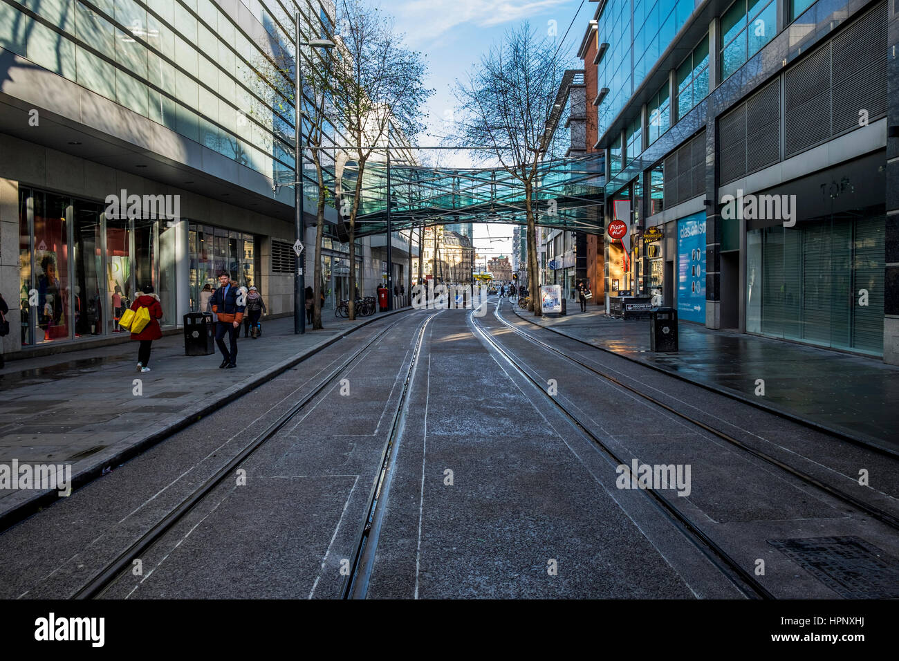 The new Metrolink tramway through Manchester Stock Photo - Alamy