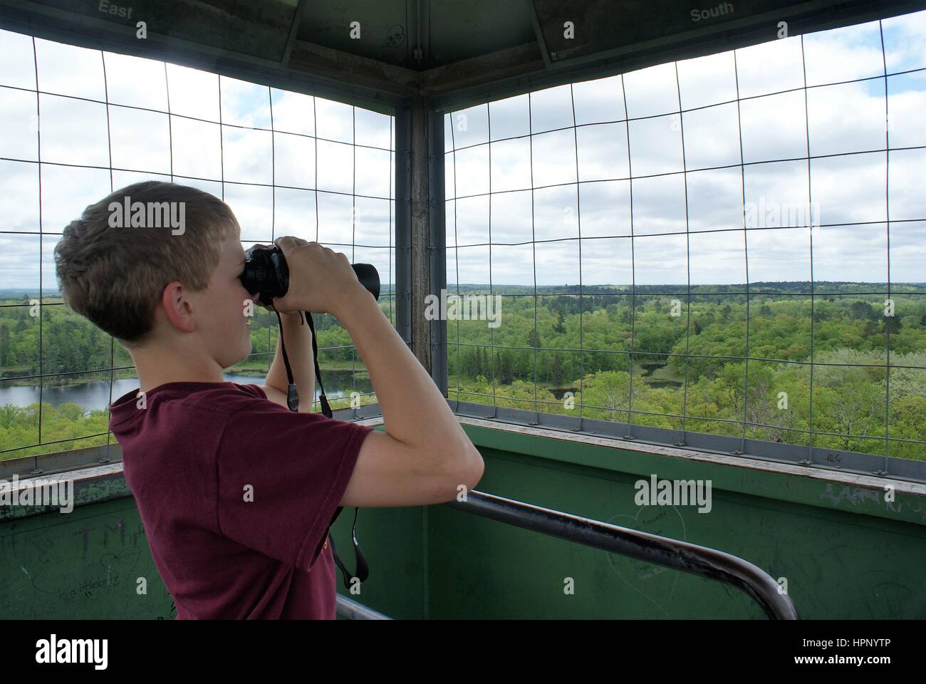 Children binoculars sky hi-res stock photography and images - Alamy