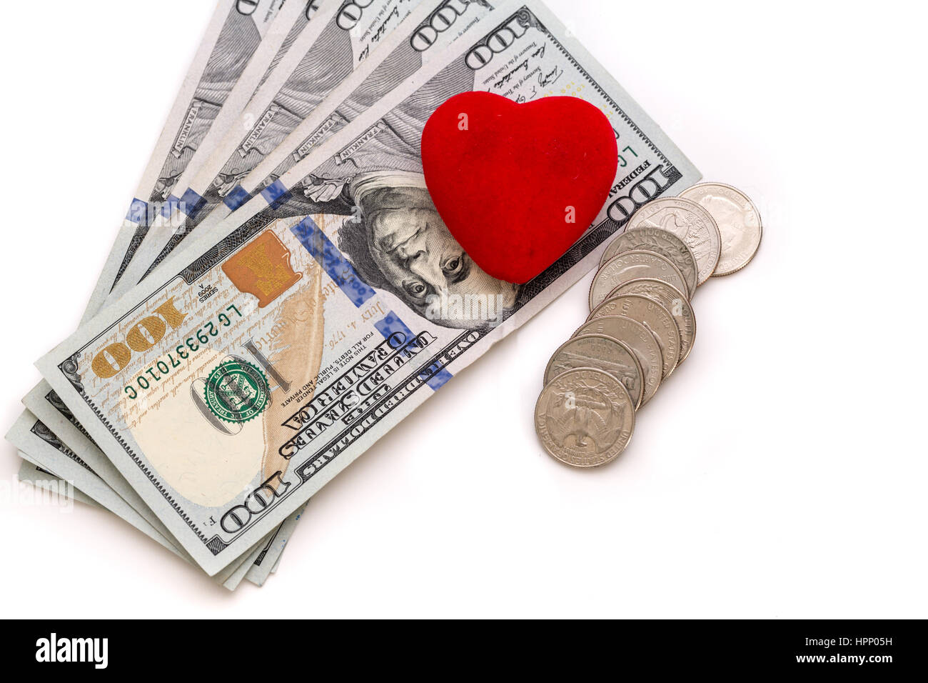 Love of money, cash and coins with red heart shape Stock Photo - Alamy
