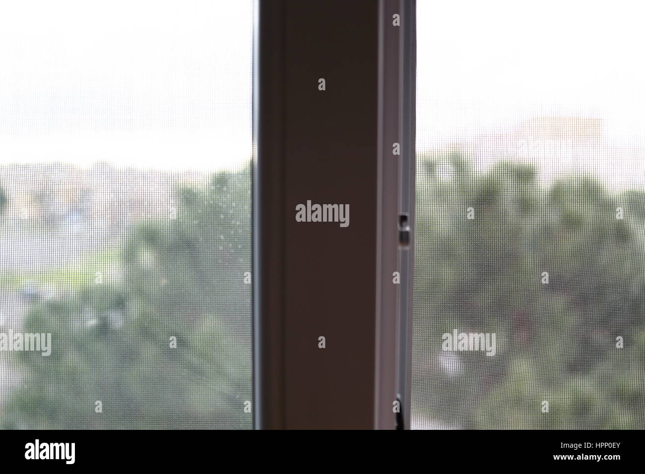 Mosquito net on a PVC window Stock Photo - Alamy