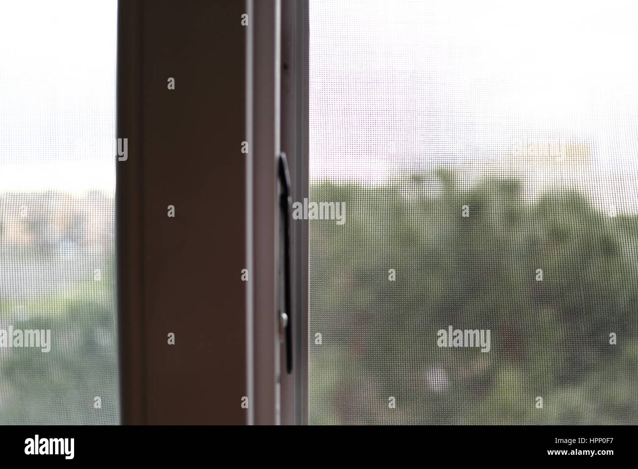Mosquito net on a PVC window Stock Photo - Alamy