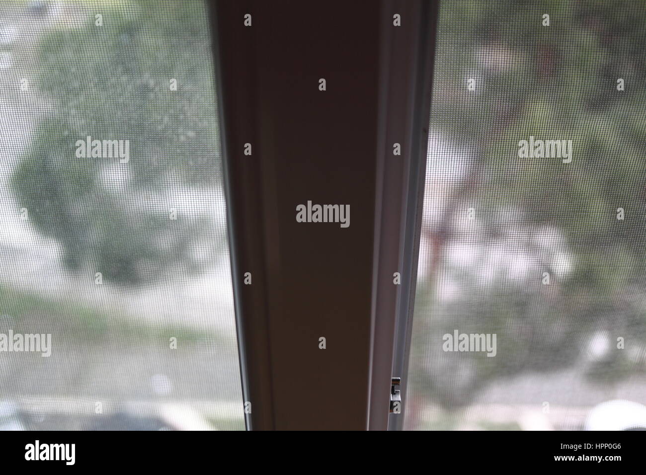 Mosquito net on a PVC window Stock Photo - Alamy