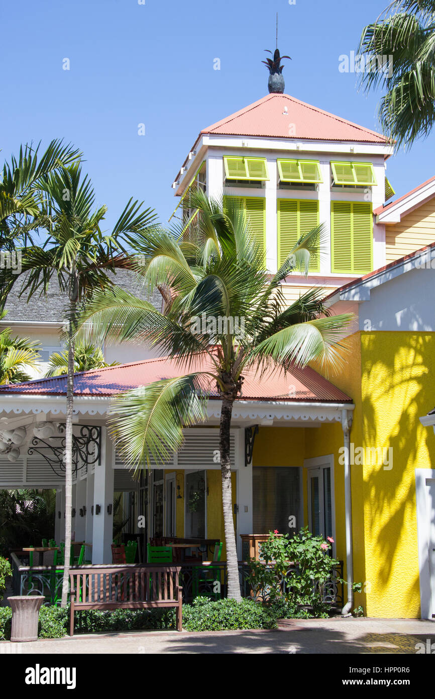 The yellow color restaurant surounded by palms on Paradise Island (The ...