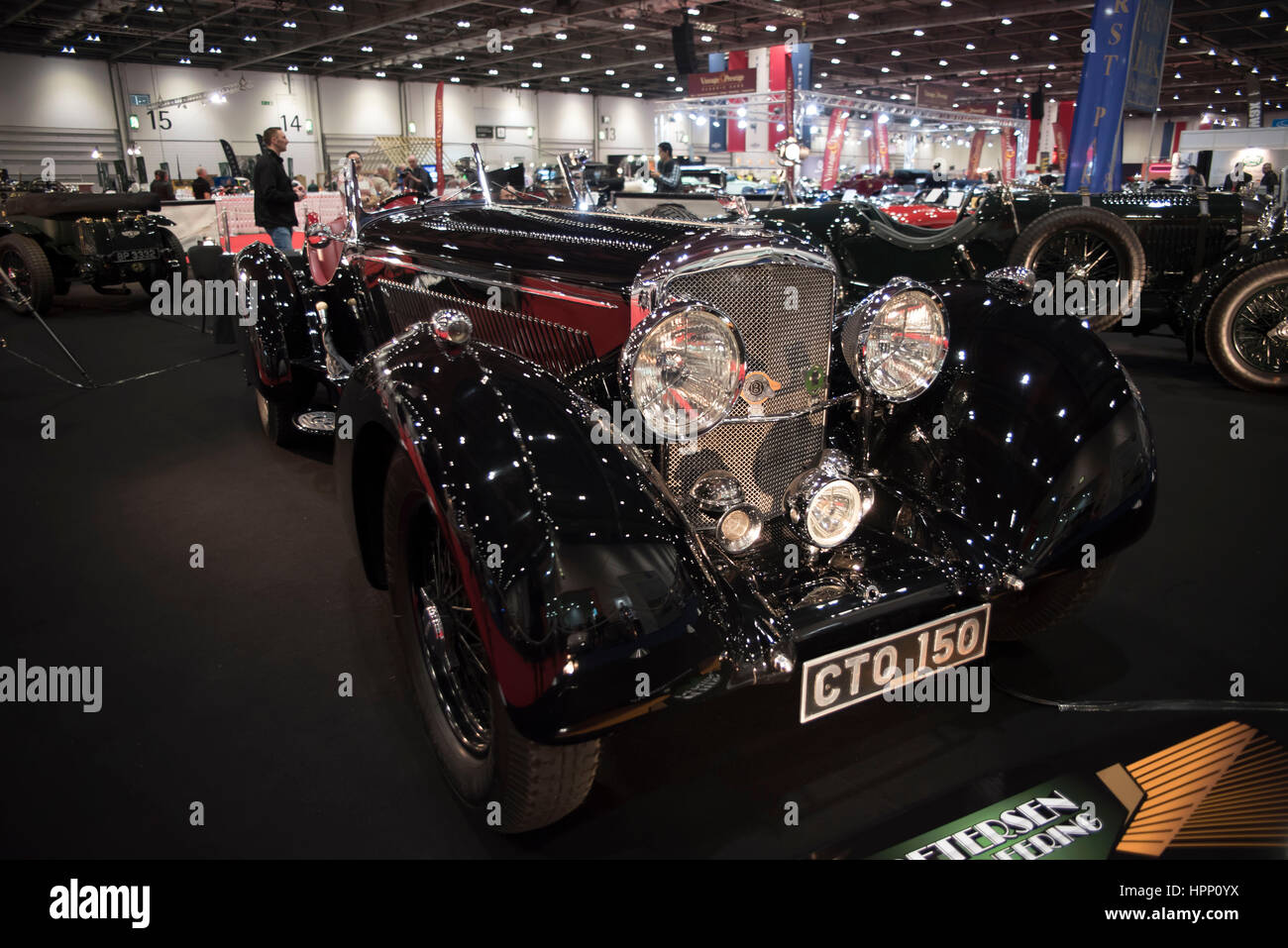 London, UK. 23rd Feb, 2017. Vintage and new sports cars are displayed ...