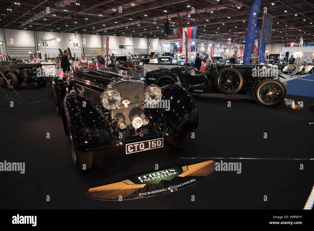 London, UK. 23rd Feb, 2017. Vintage and new sports cars are displayed ...