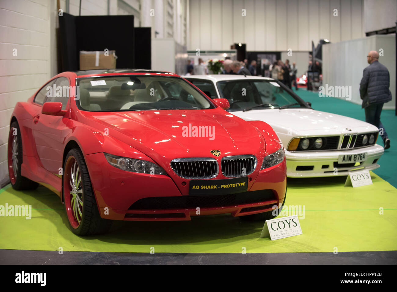 London, UK. 23rd Feb, 2017. Vintage and new sports cars are displayed ...